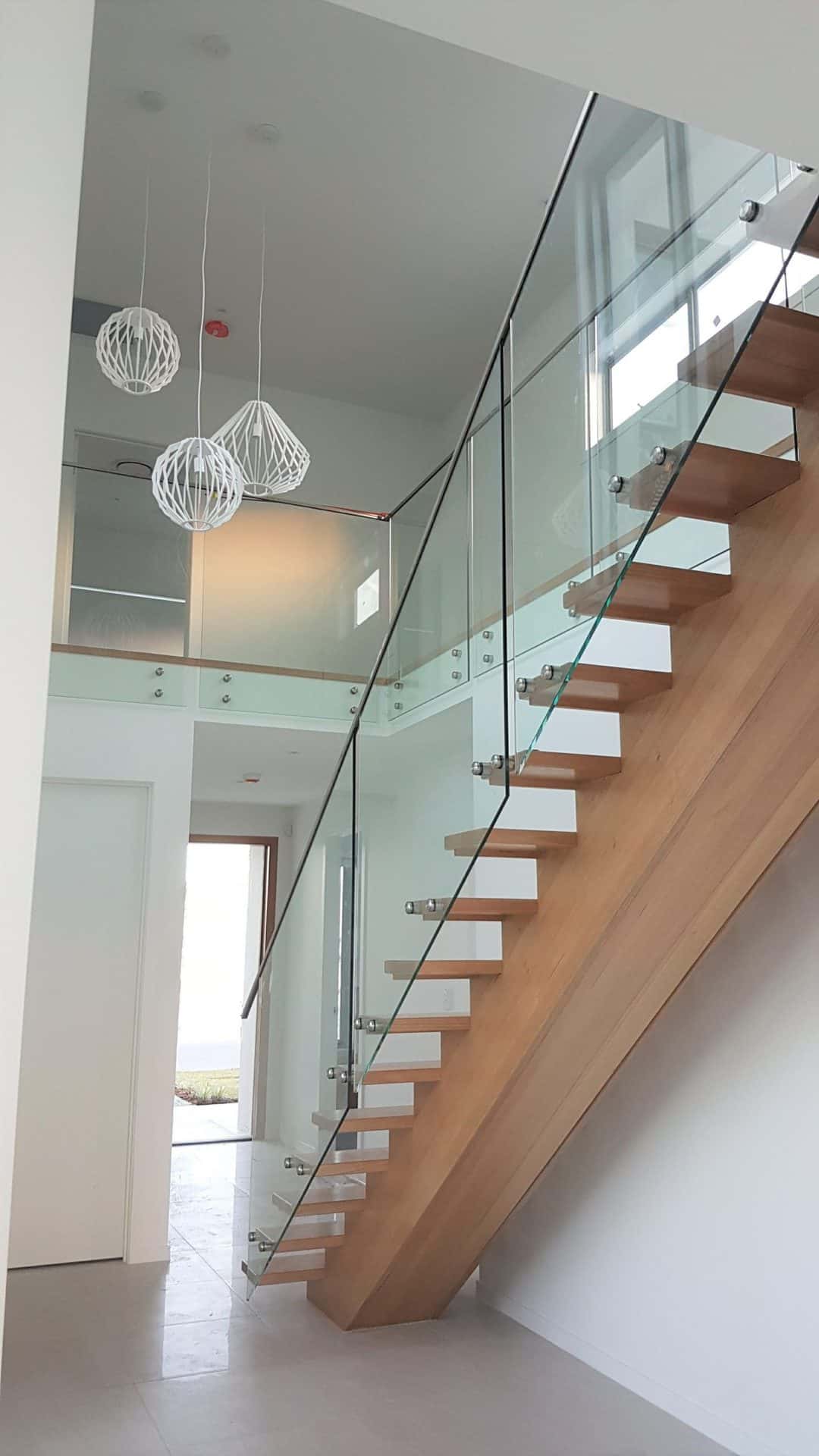 Gold Coast Glass Stair Balustrade by Insular Pool Fencing